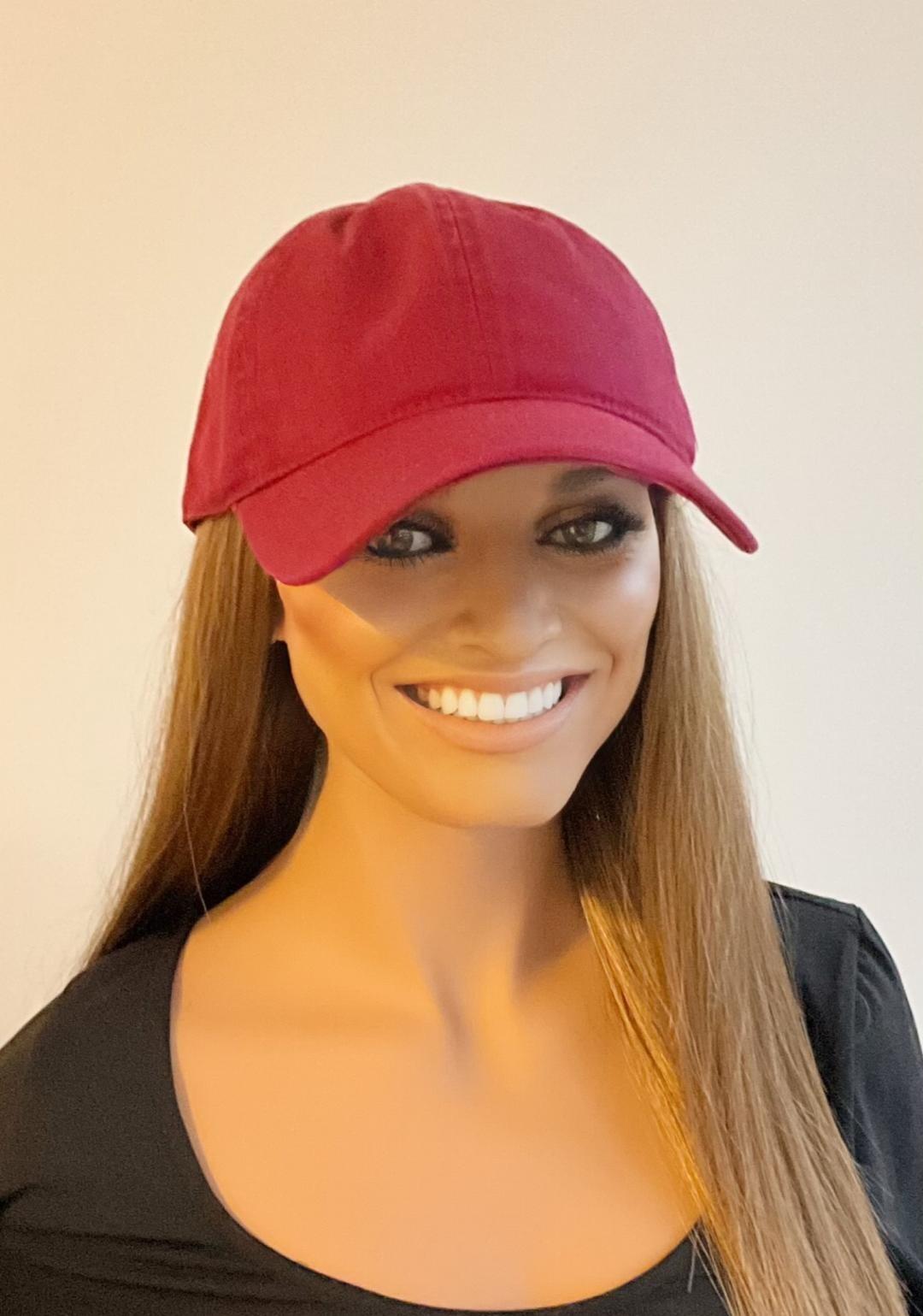 Burgundy baseball cap with long length hair