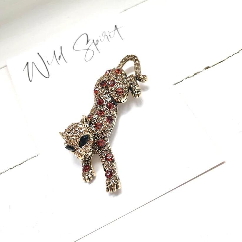 Brown leopard brooch