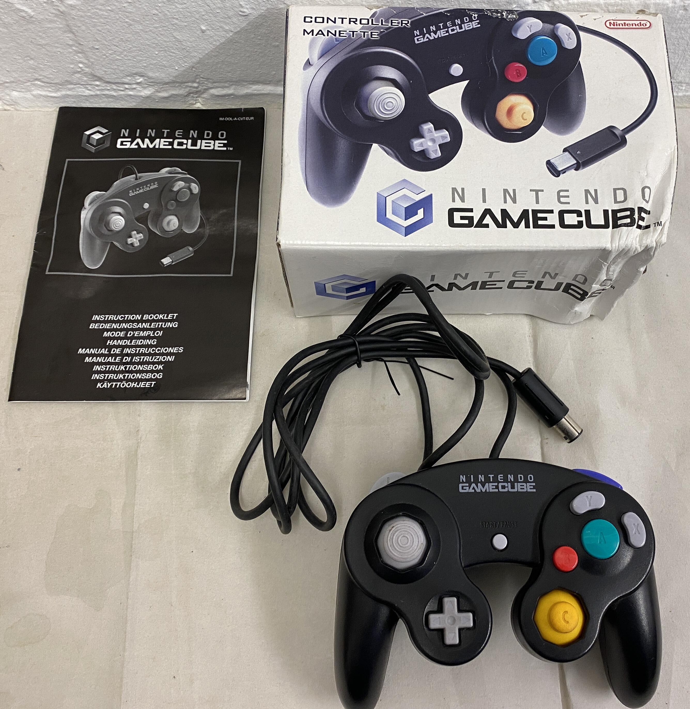 Boxed official black Nintendo GameCube controller