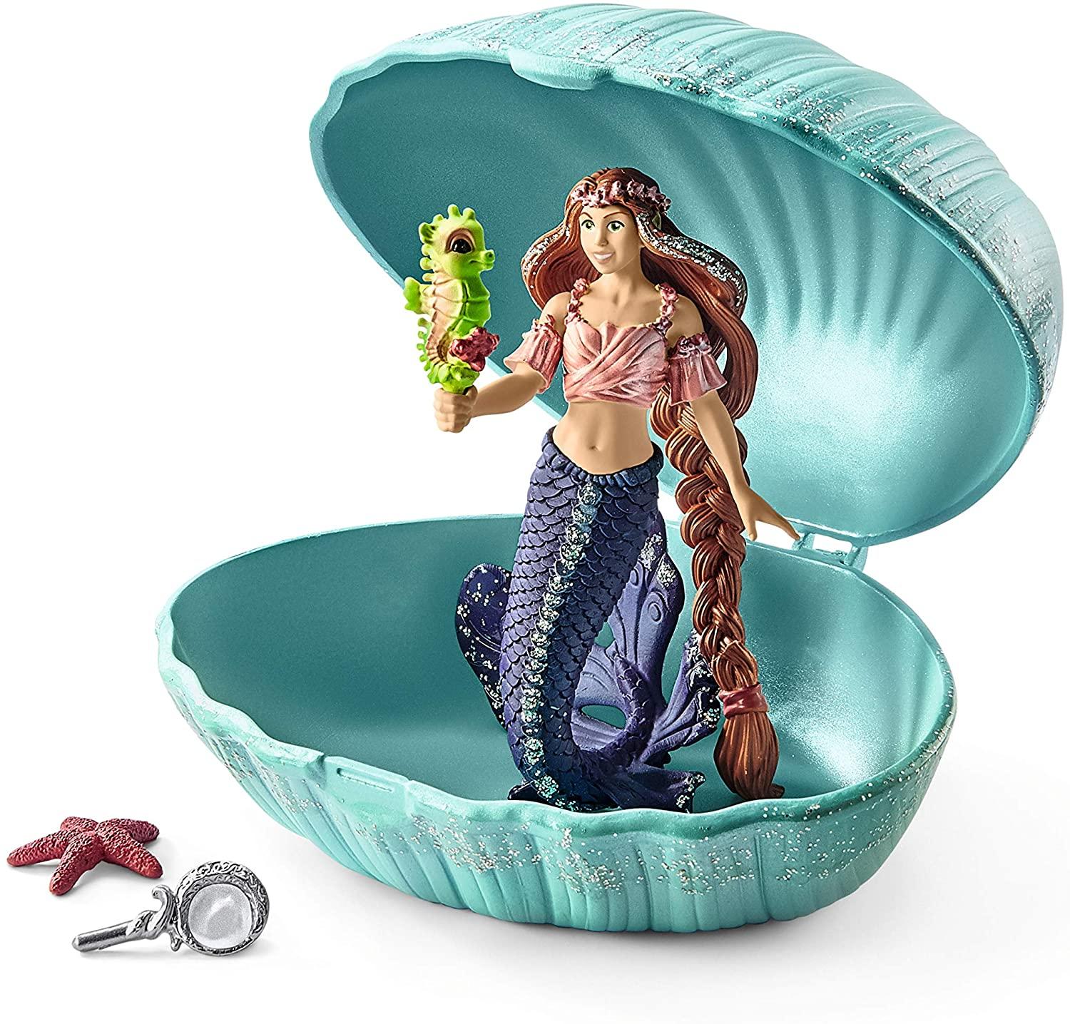 Mermaid in seashell with baby seahorse