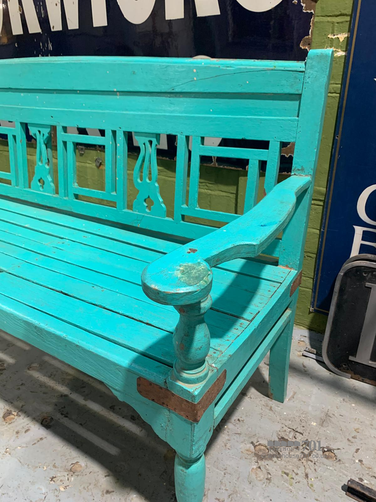 Wooden bench painted turquoise