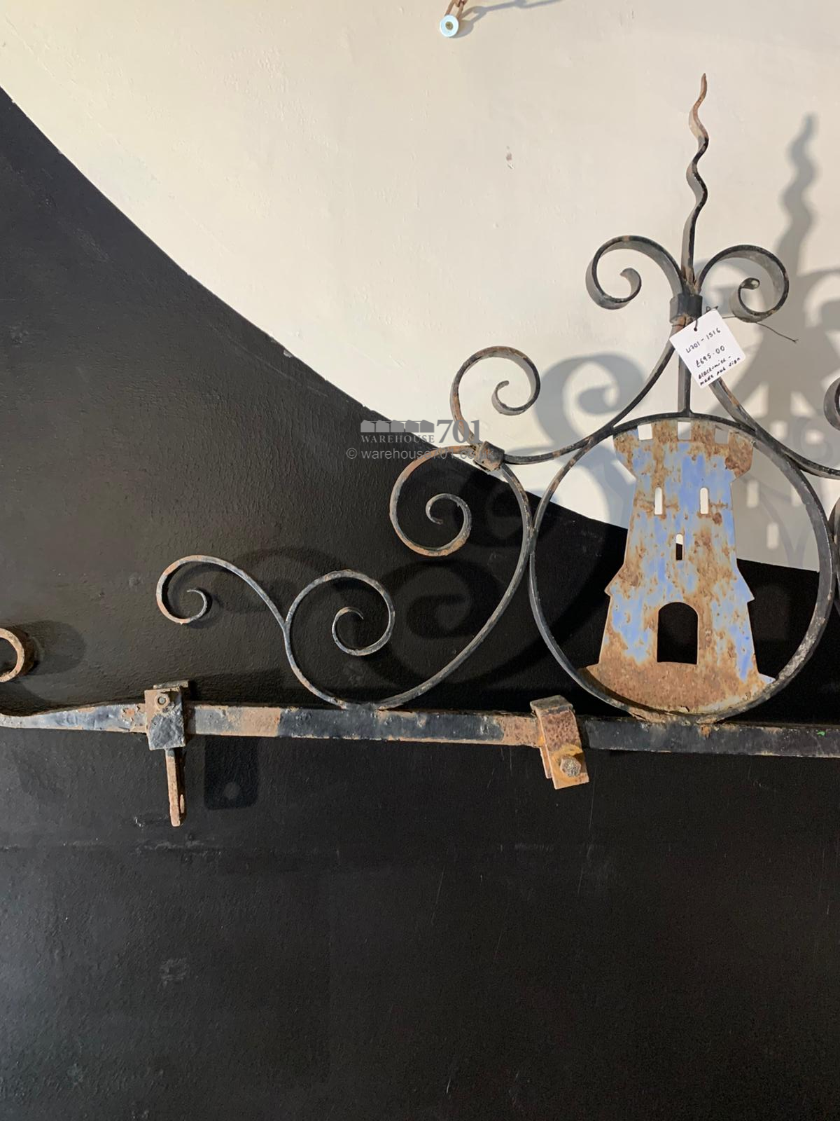 Antique blacksmith-made castle pub sign bracket