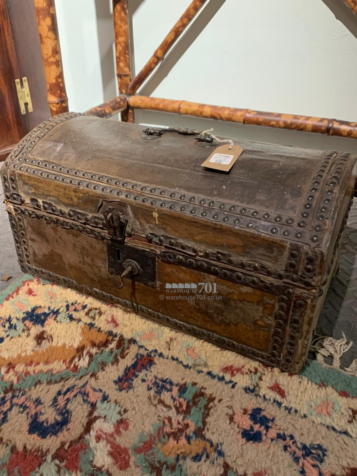 Antique hide covered dometop trunk