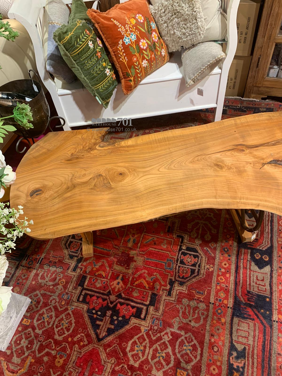 Cherry wood cast iron wheel base coffee table