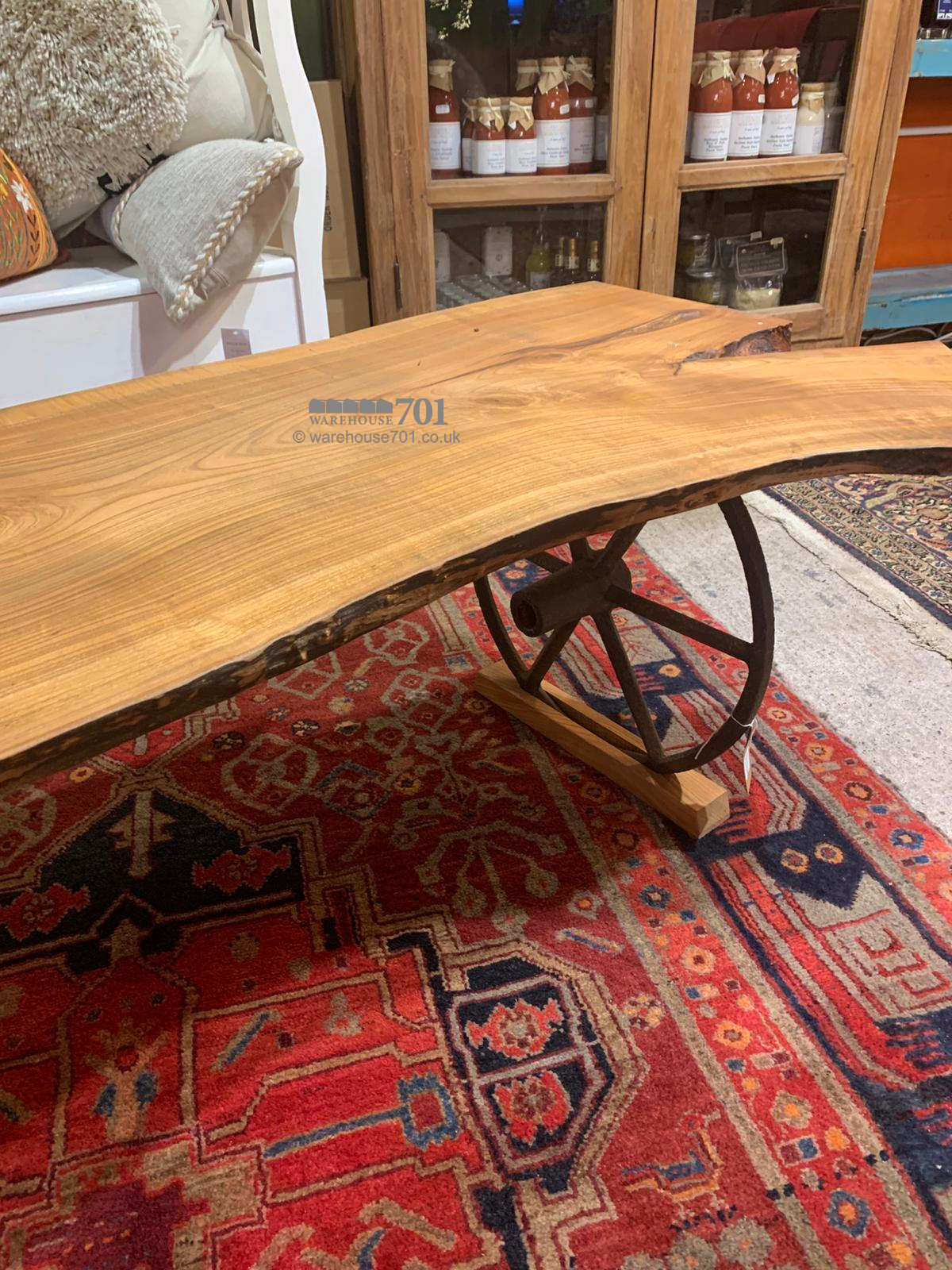 Cherry wood cast iron wheel base coffee table