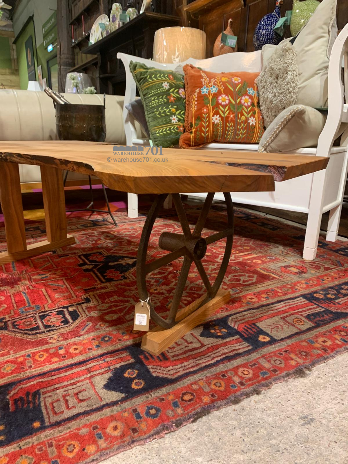 Cherry wood cast iron wheel base coffee table