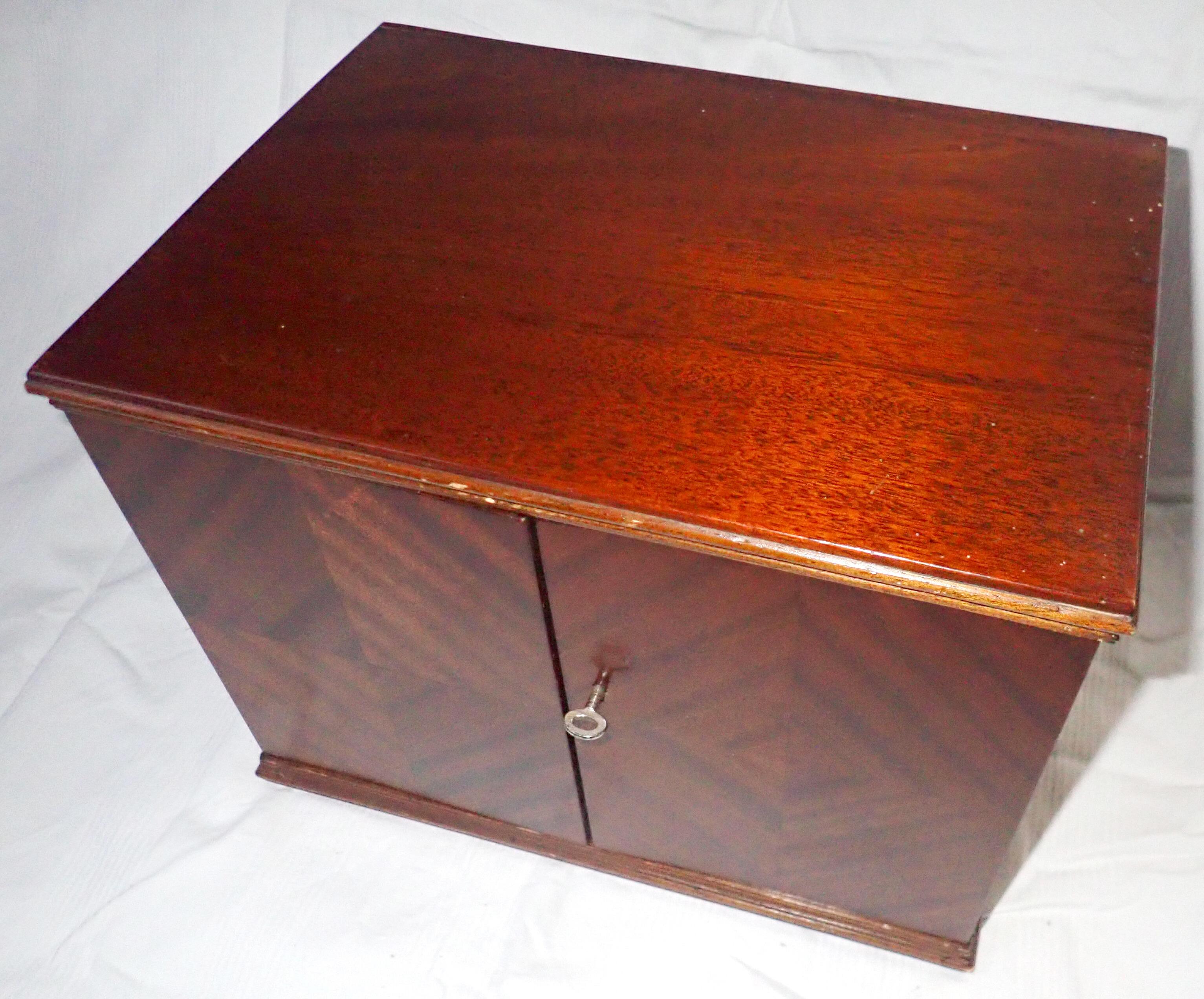 Modern mahogany coin cabinet