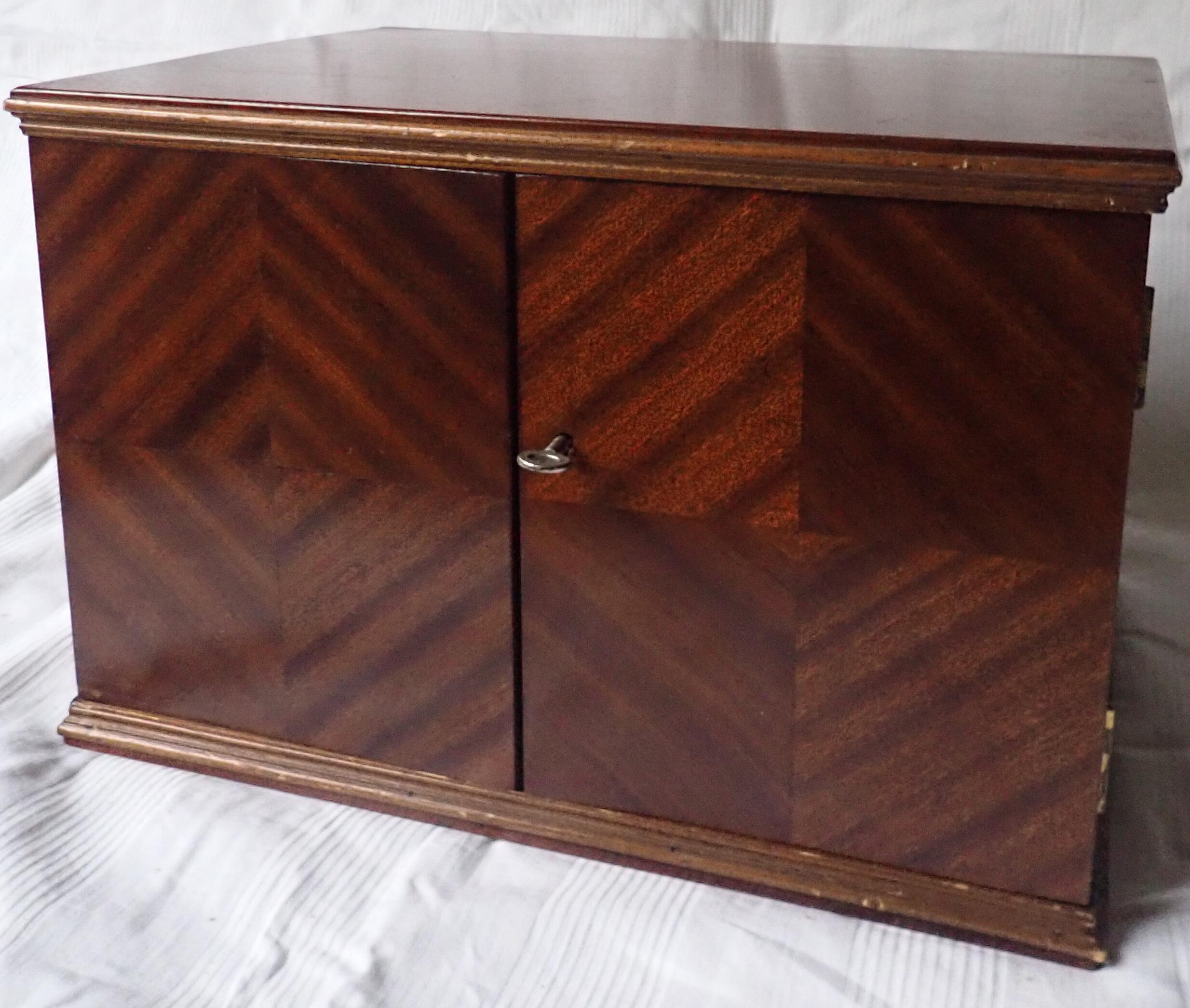 Modern mahogany coin cabinet