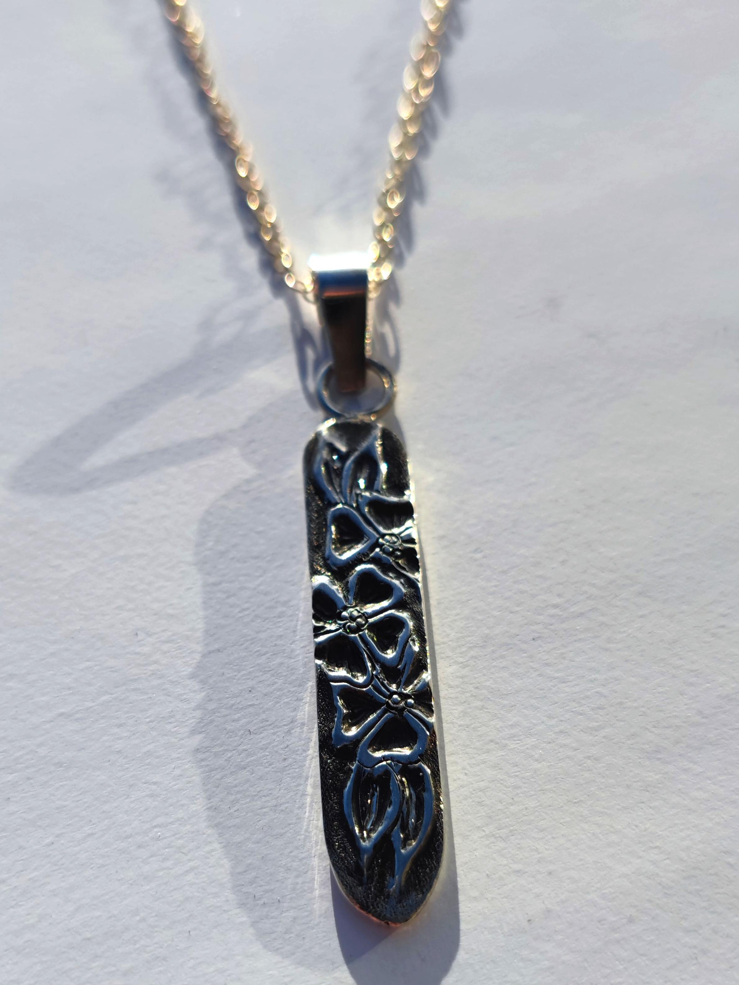 Hand Engraved Floral Pendant, long and narrow pendant in Sterling Silver