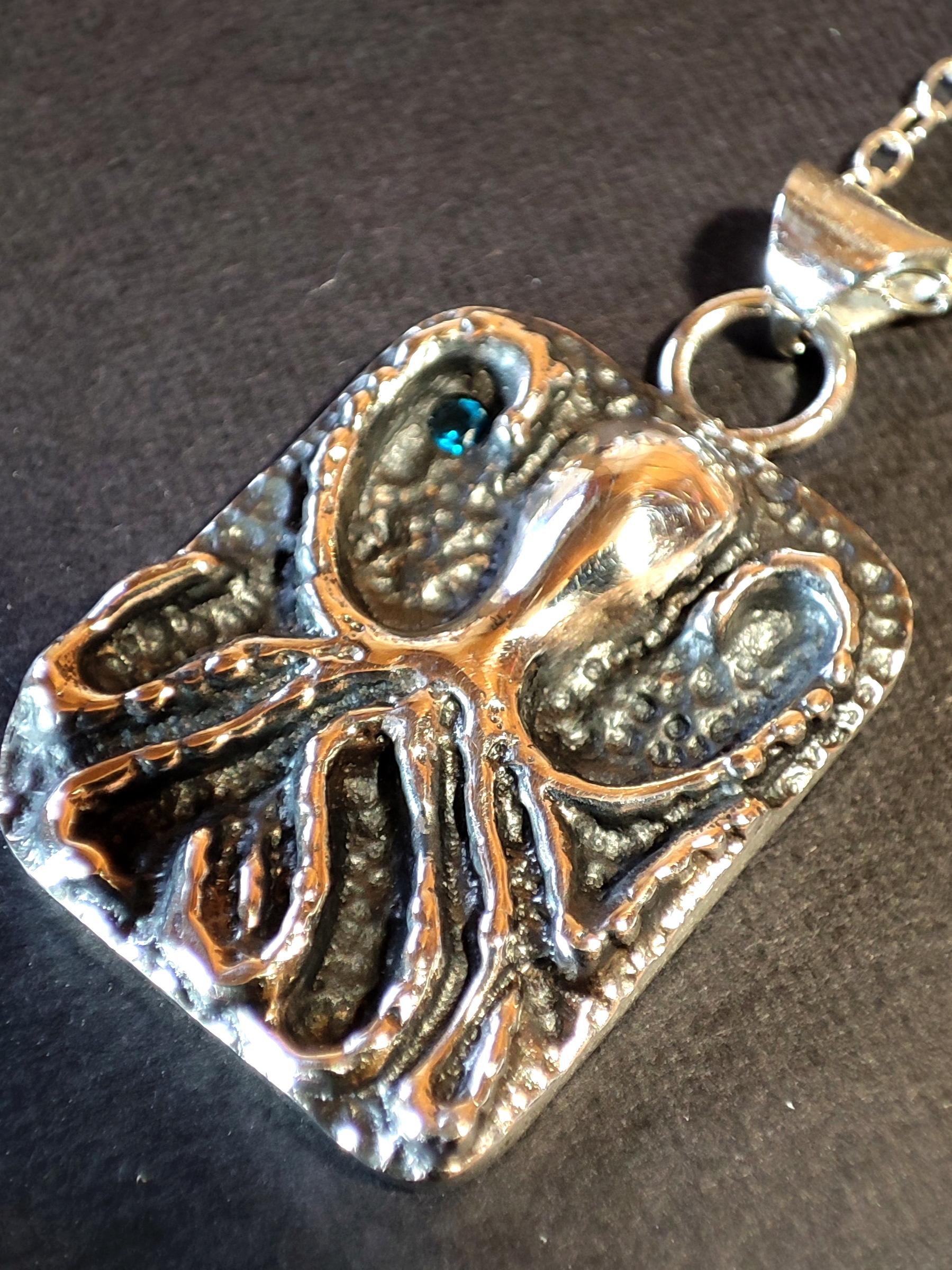 Sterling Silver Octopus Pendant with Aqua Blue CZ