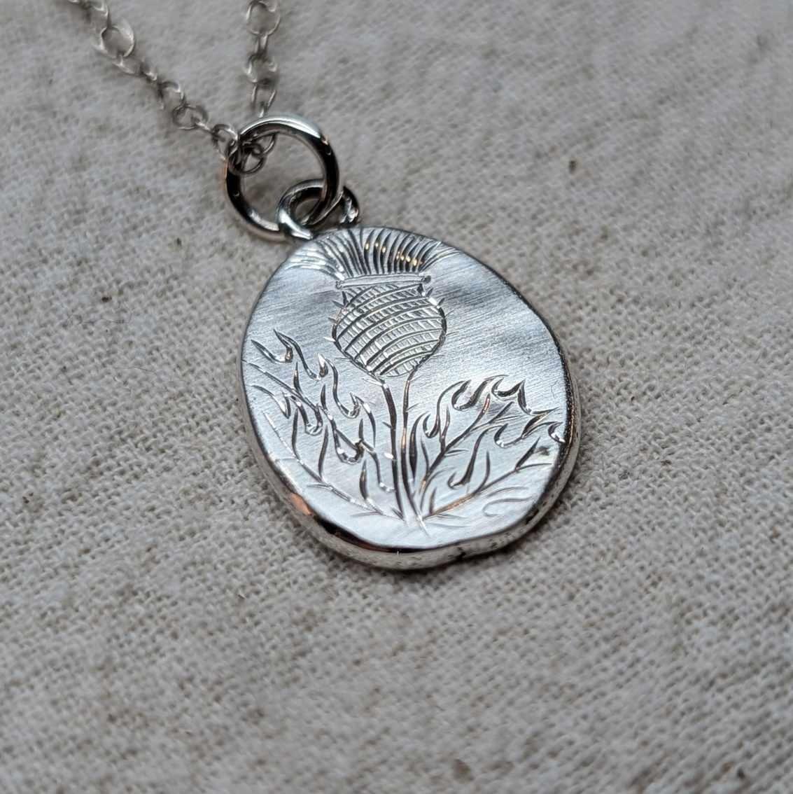 Pebble Pendant with hand engraved Scottish Thistle design, with brush ...
