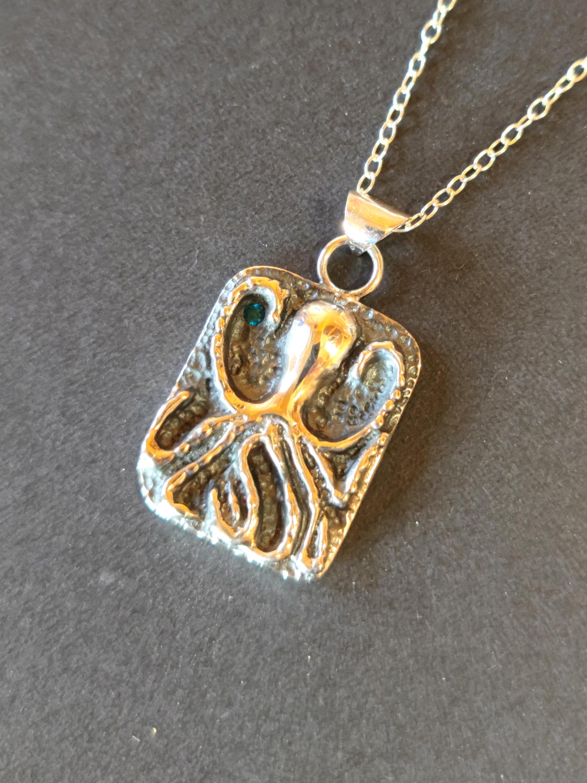 Sterling Silver Octopus Pendant with Aqua Blue CZ