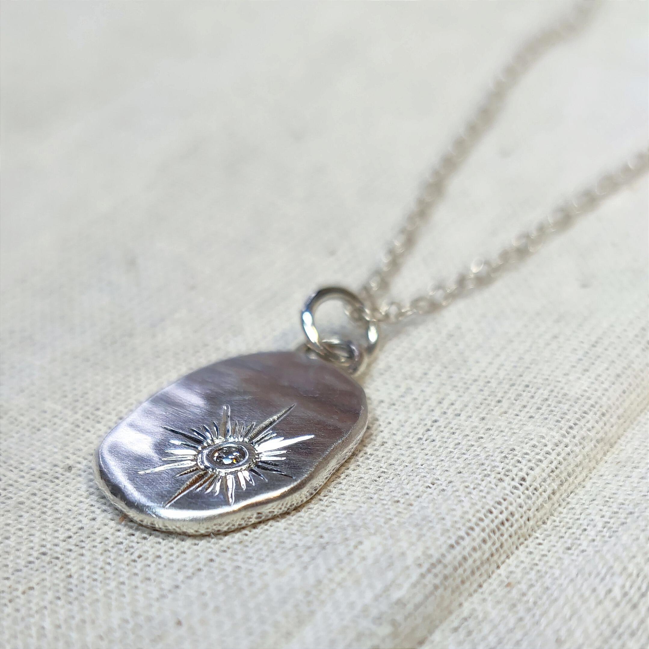 Pebble Pendant with hand engraved Sun design and 2mm Cubic Zirconia ...