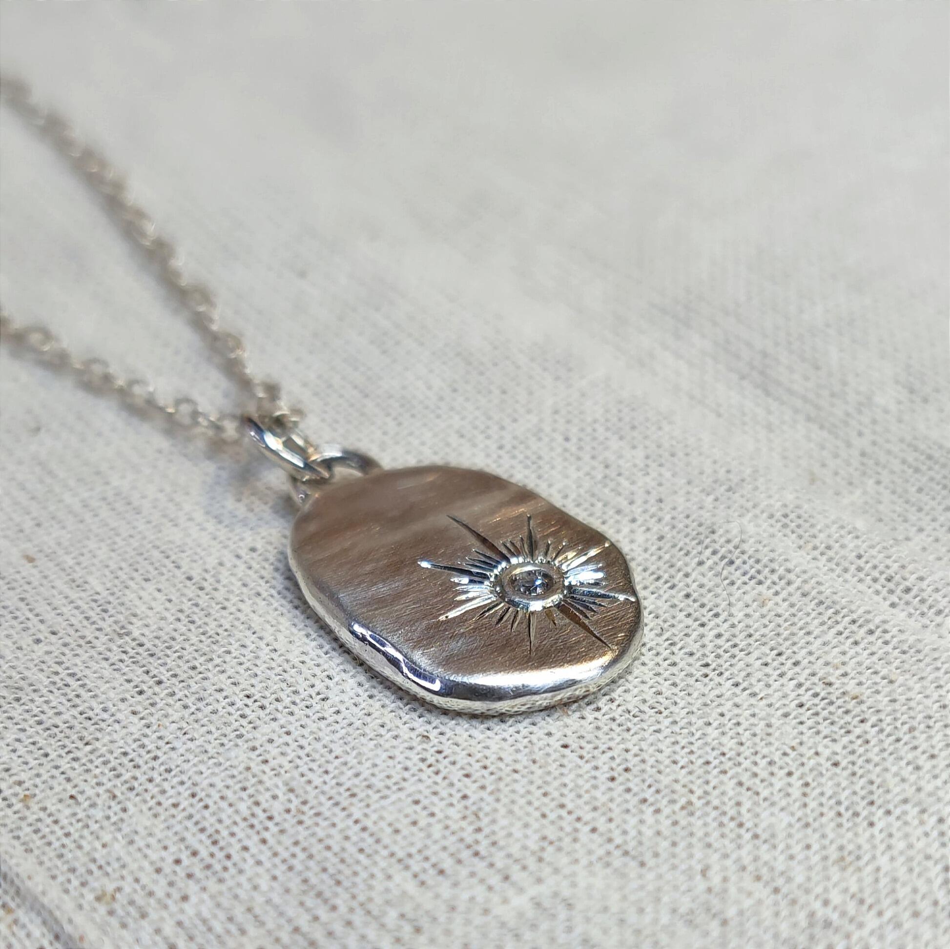 Pebble Pendant with hand engraved Sun design and 2mm Cubic Zirconia ...
