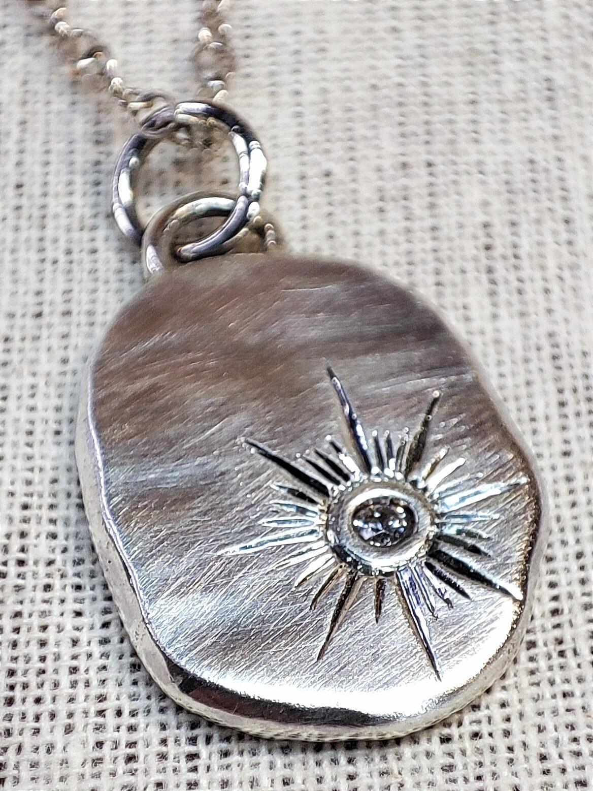 Pebble Pendant with hand engraved Sun design and 2mm Cubic Zirconia ...