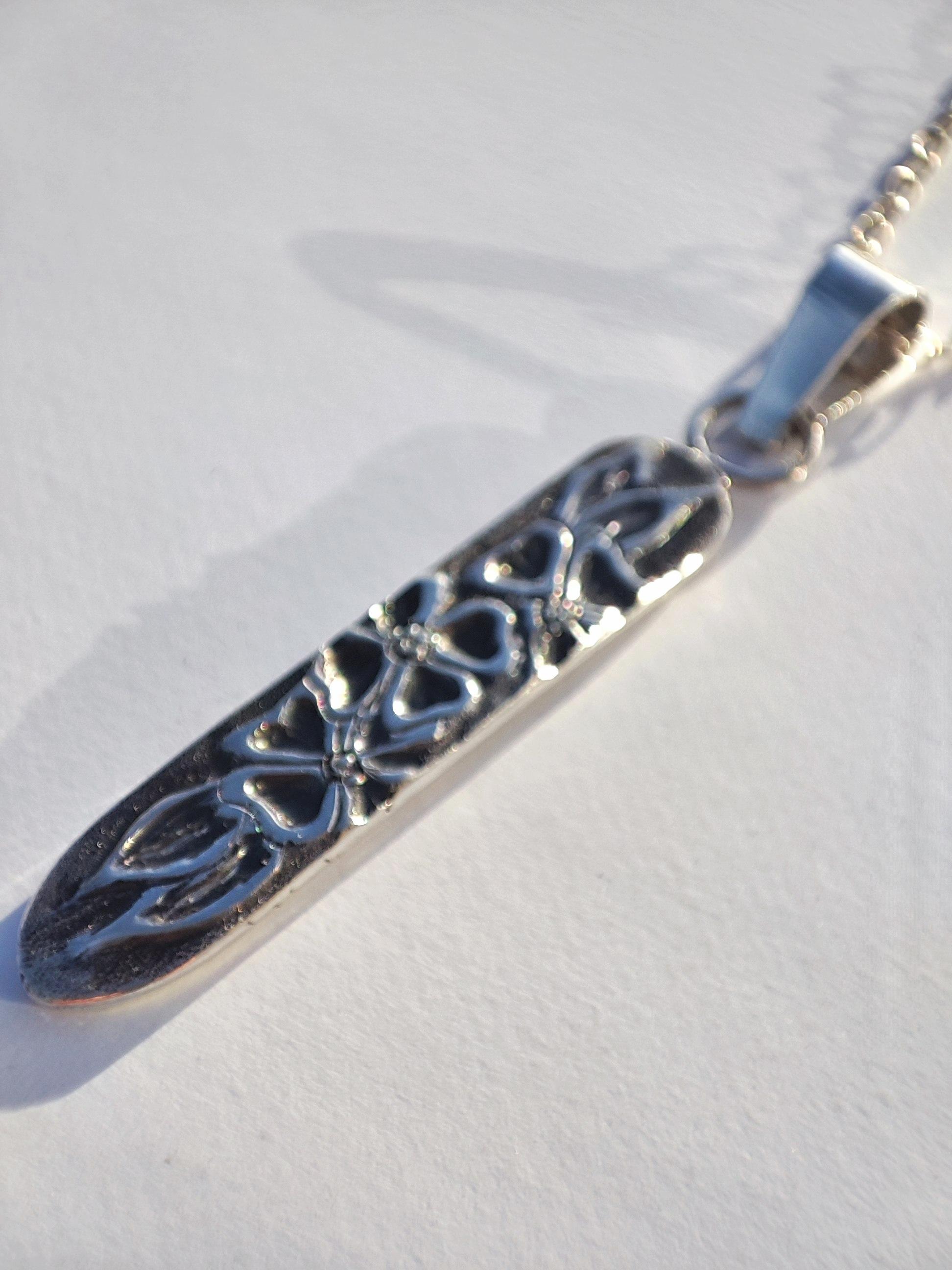 Hand Engraved Floral Pendant, long and narrow pendant in Sterling Silver