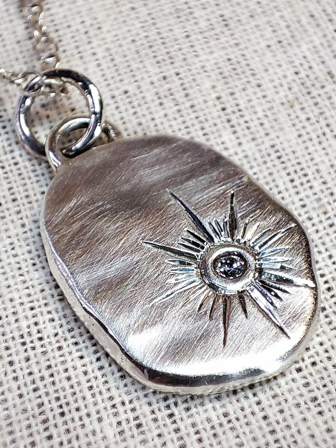 Pebble Pendant with hand engraved Sun design and 2mm Cubic Zirconia ...