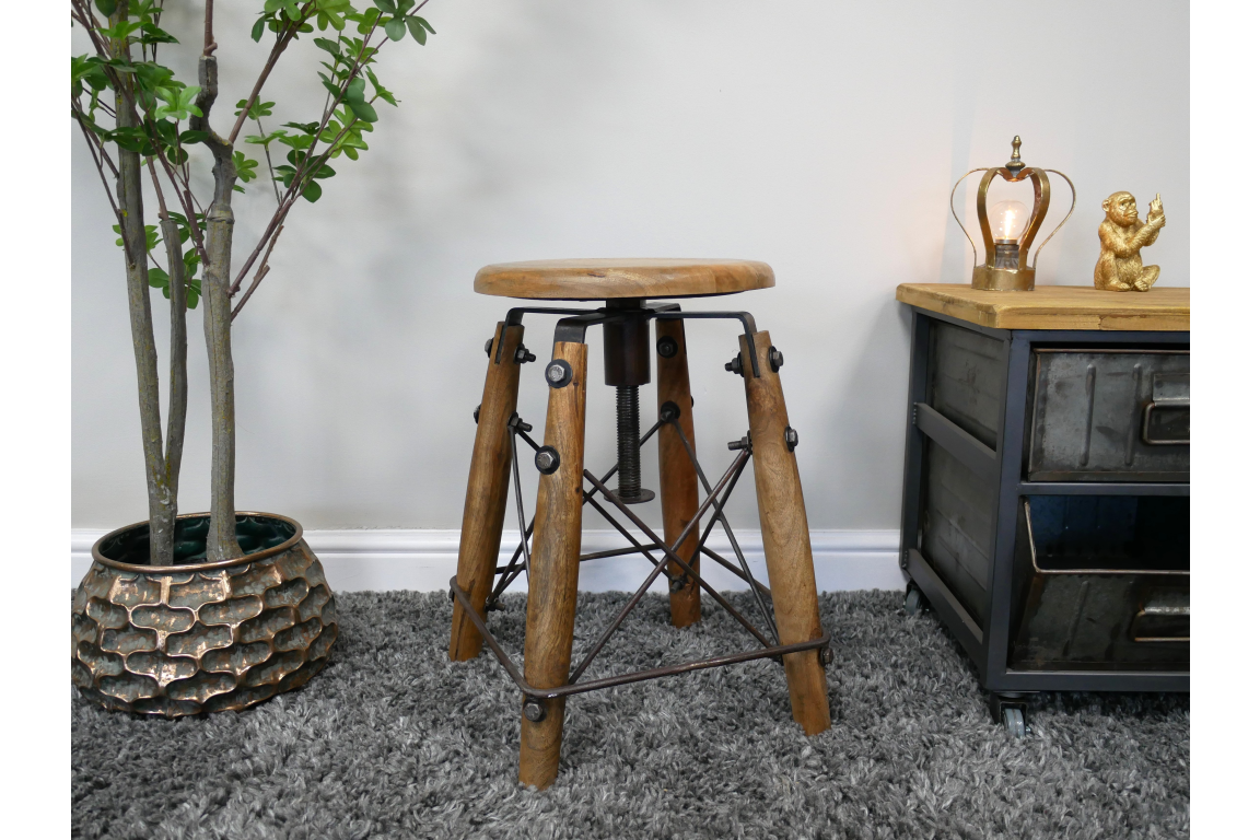 AN ADJUSTABLE HEIGHT INDUSTRIAL STOOL
