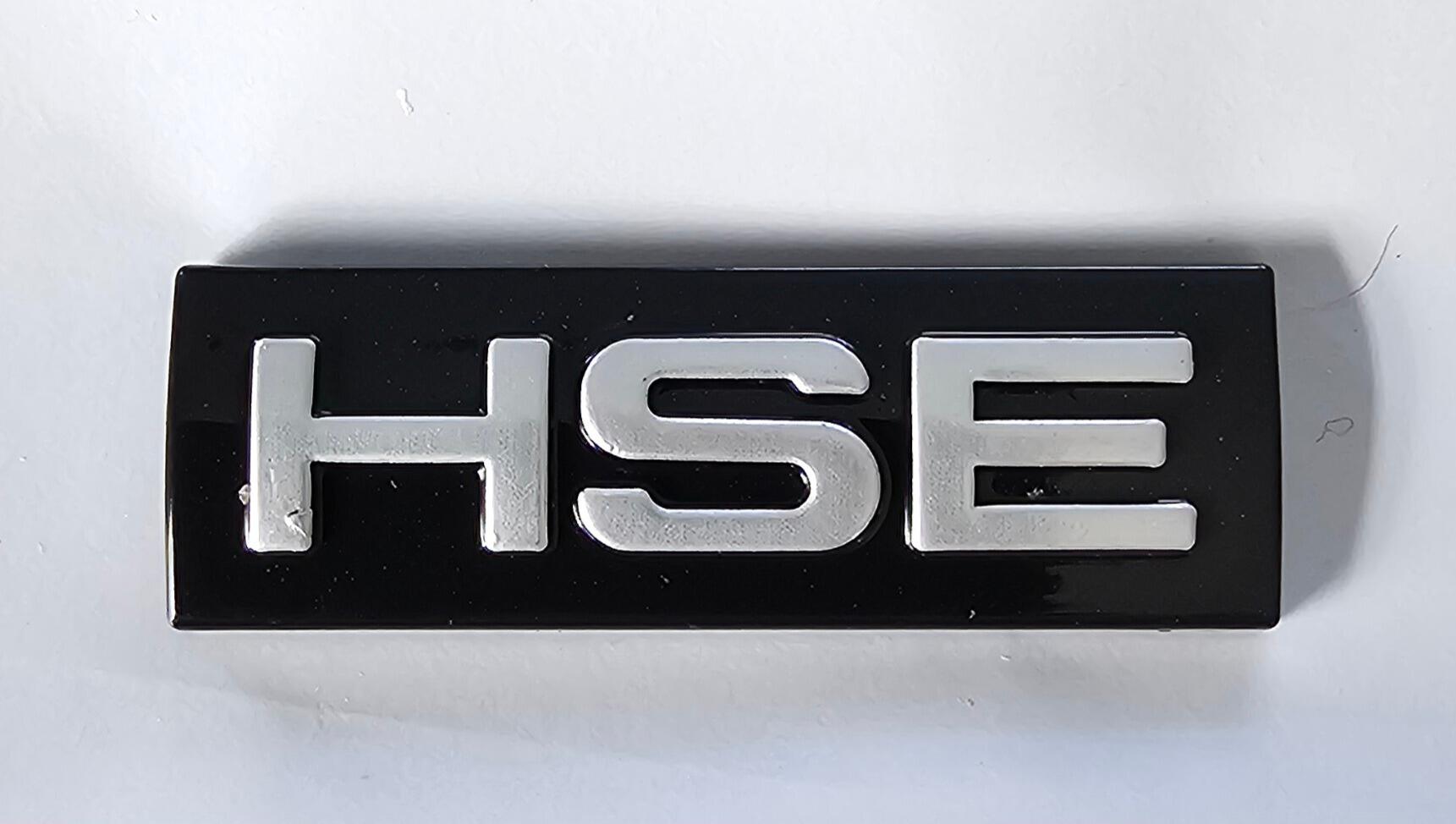 Range Rover Gloss Black/Silver HSE badge.