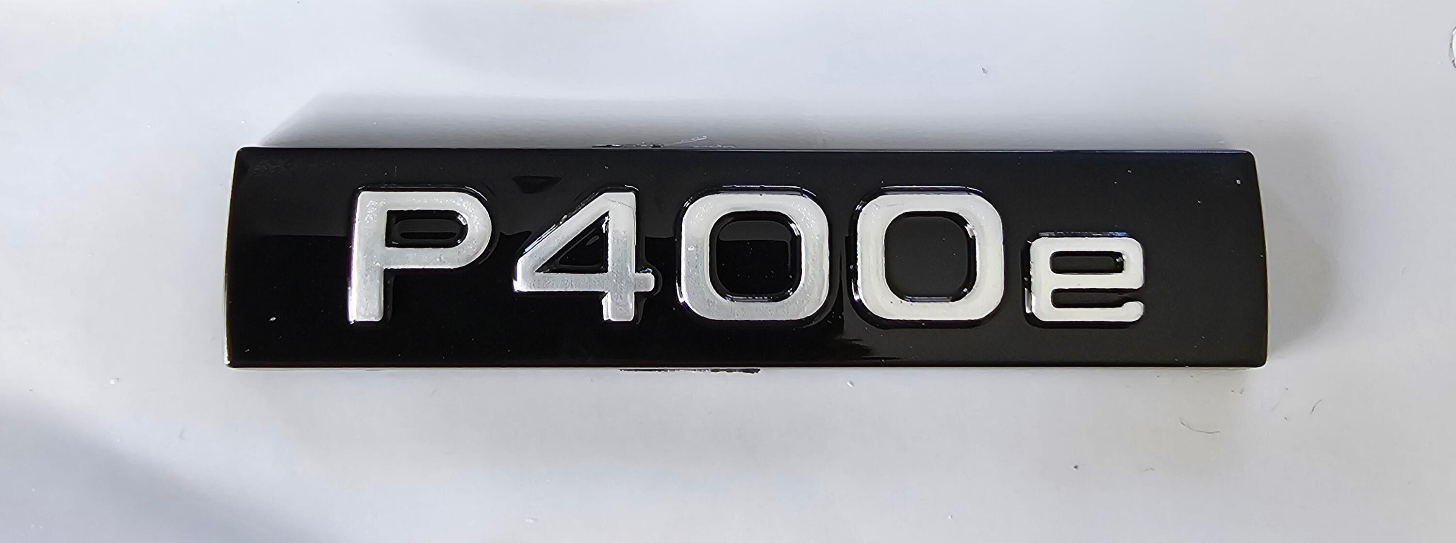 Range Rover Gloss Black/Silver P400e badge.