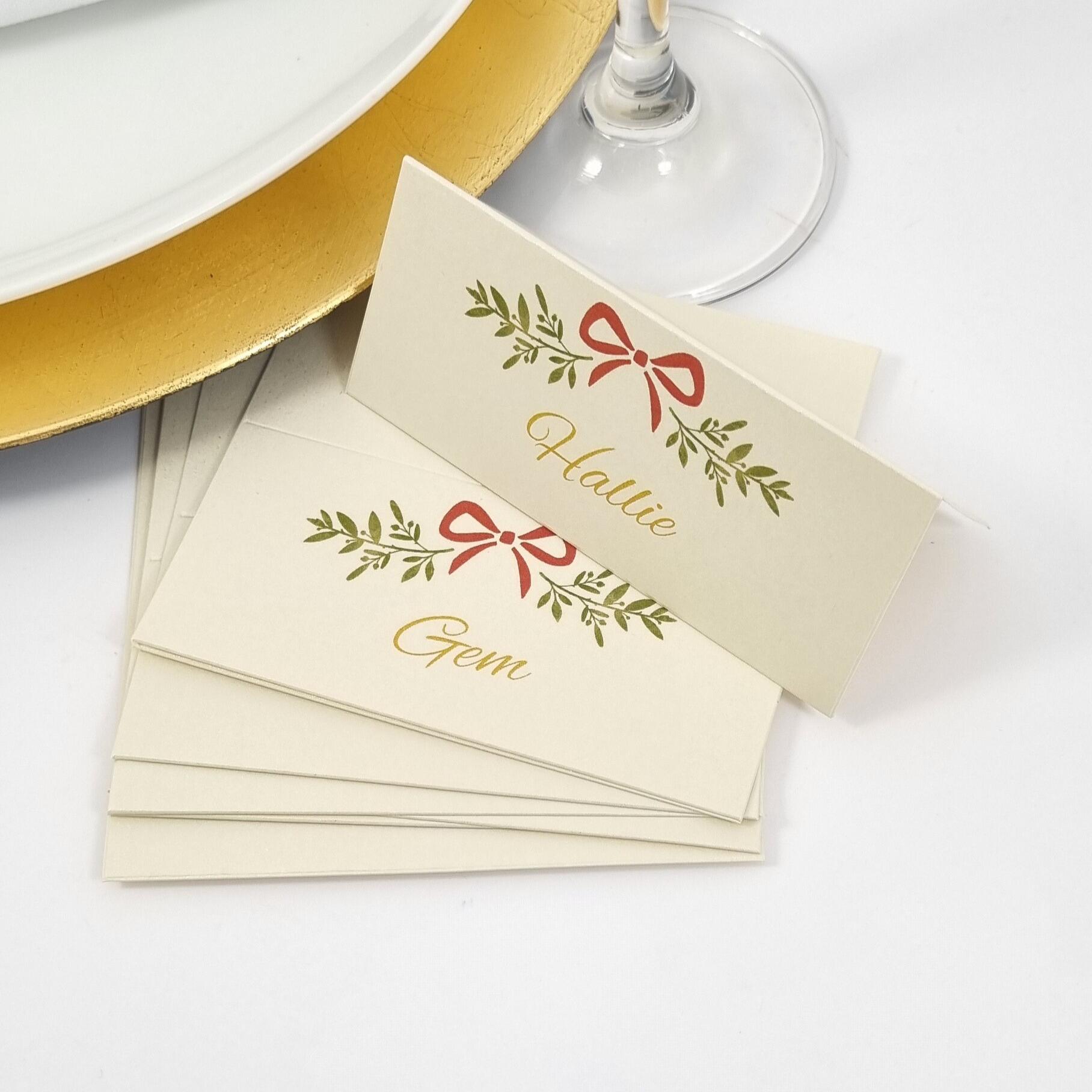 Personalised Christmas Place Cards. Mistletoe Leaf Garlands And Rec Bow ...