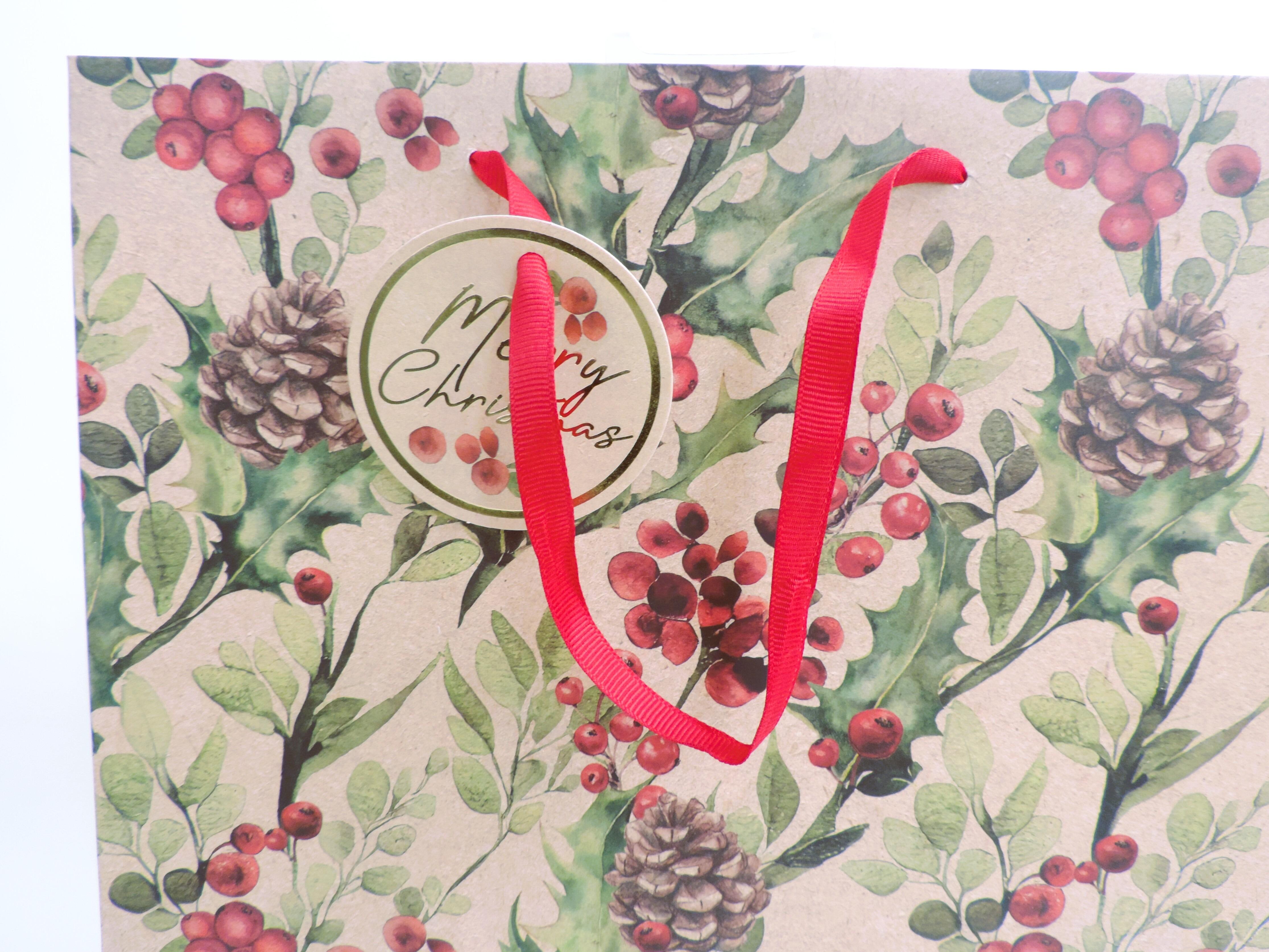 Large Christmas Paper Gift Bag with a Christmas-themed design.