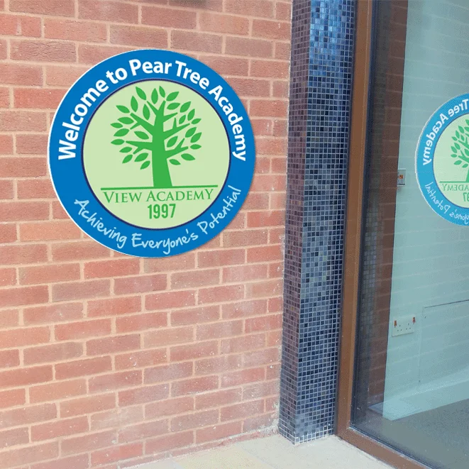 Circular Welcome Sign Featuring School Brand or Logo