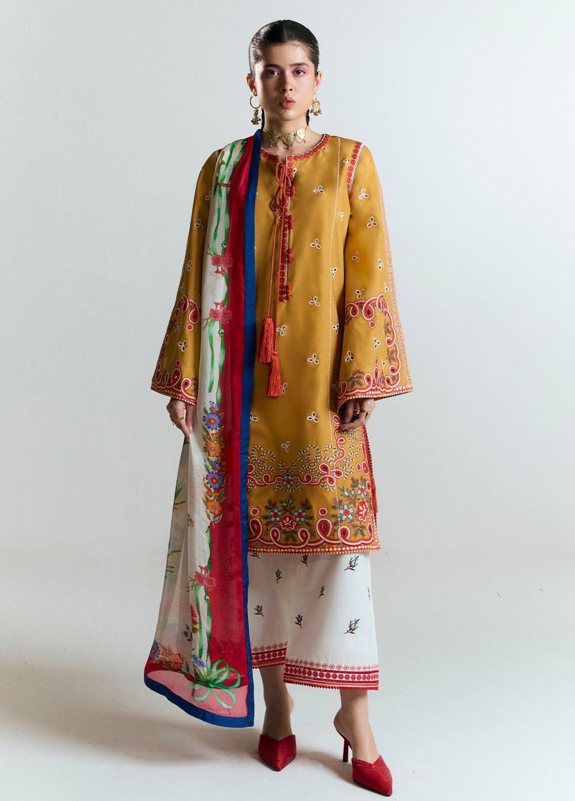Tanim Jugnu by Hussain Rehar Mustard Embroidered Lawn Summer Suits
