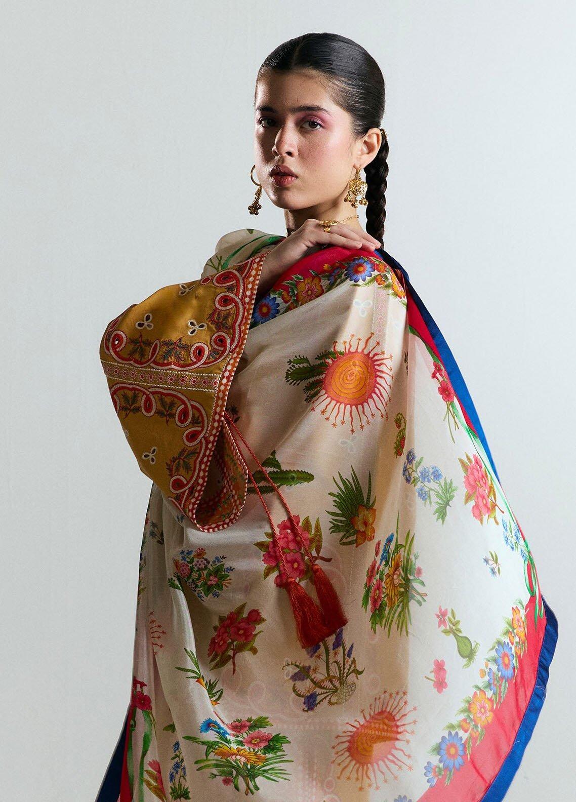 Tanim Jugnu by Hussain Rehar Mustard Embroidered Lawn Summer Suits