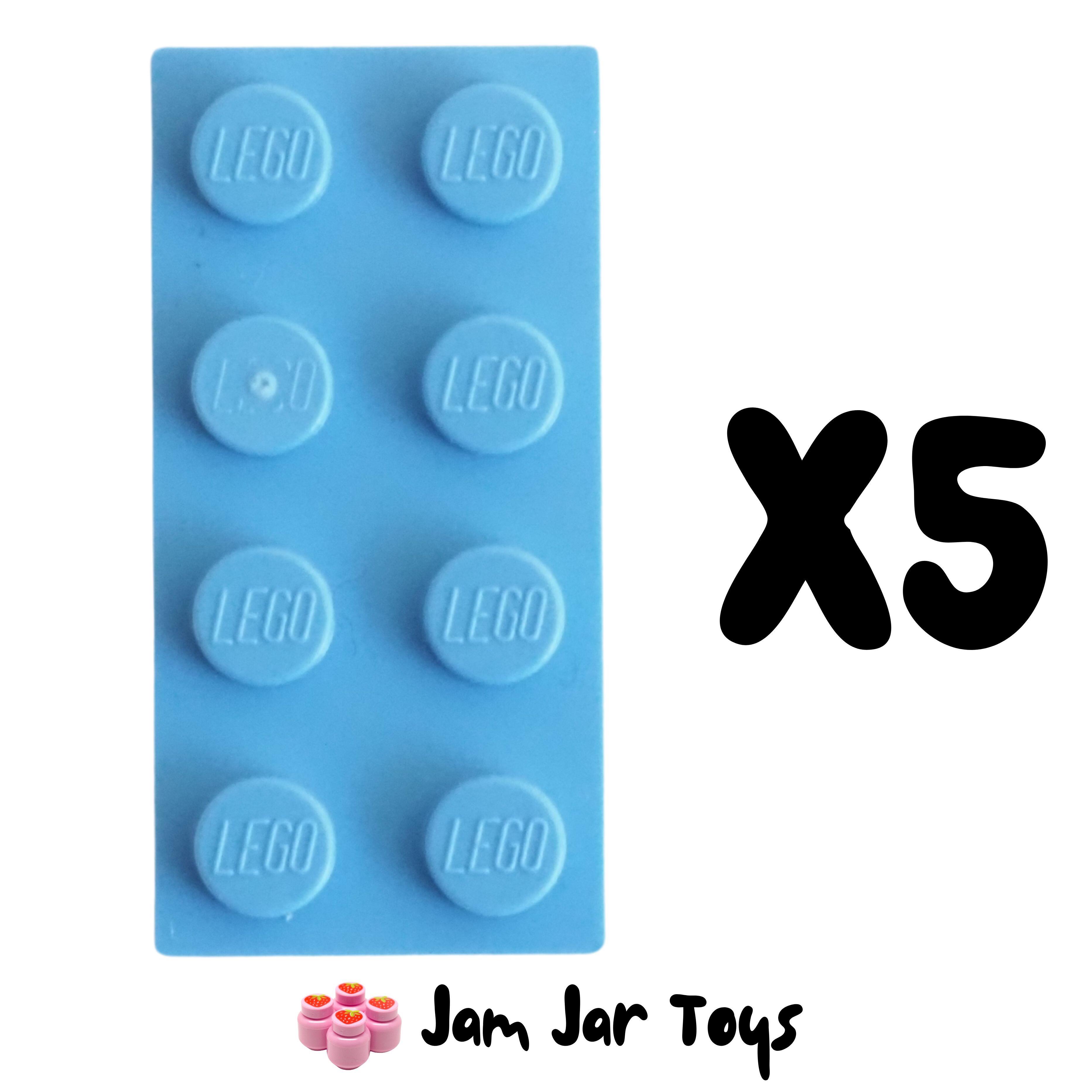 Five Medium Blue 2 x 4 Tiles. ST25