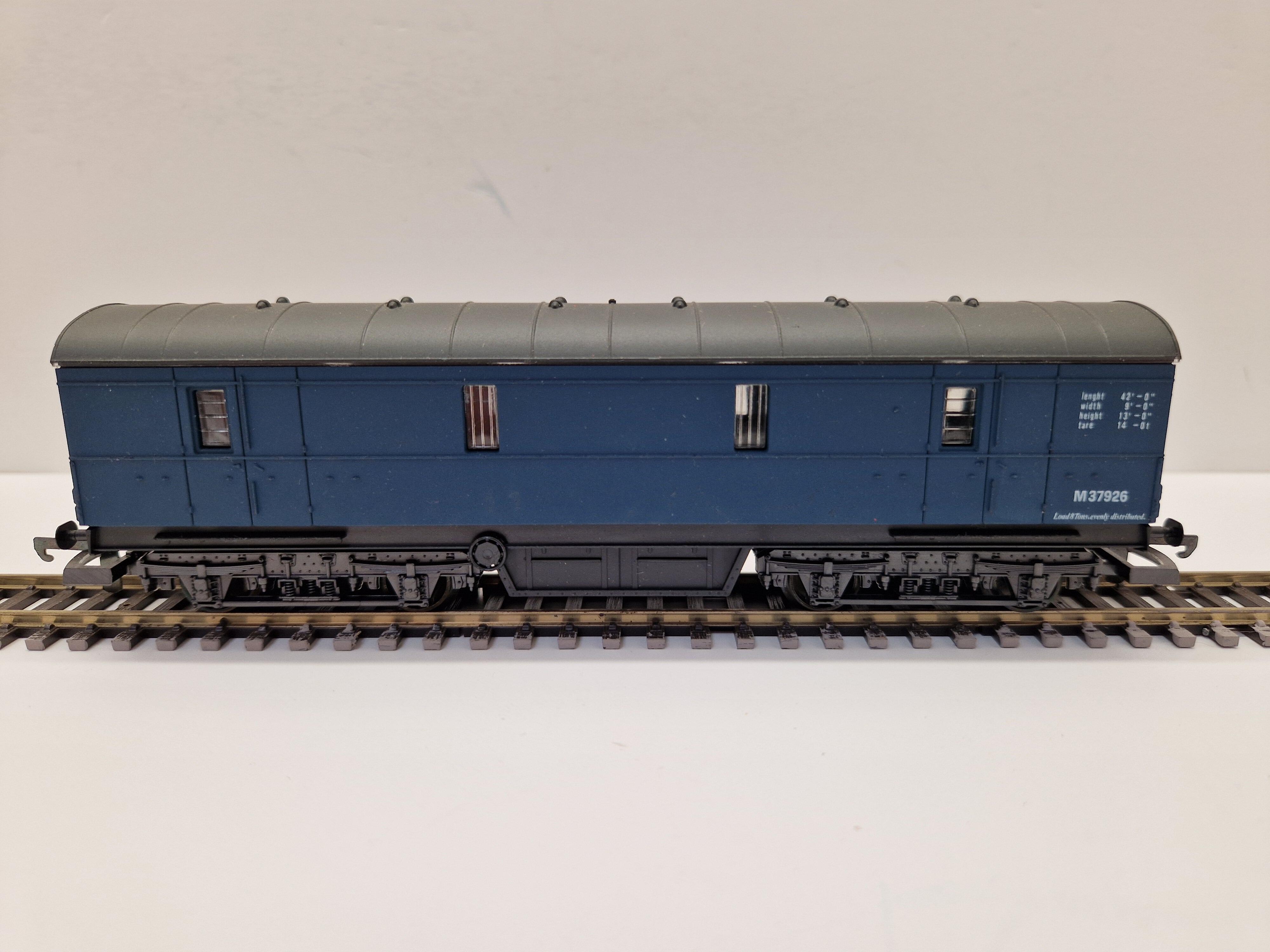 A pre-owned LIMA 305360W Ex LMS 42' GUV bogie parcels van in BR Blue