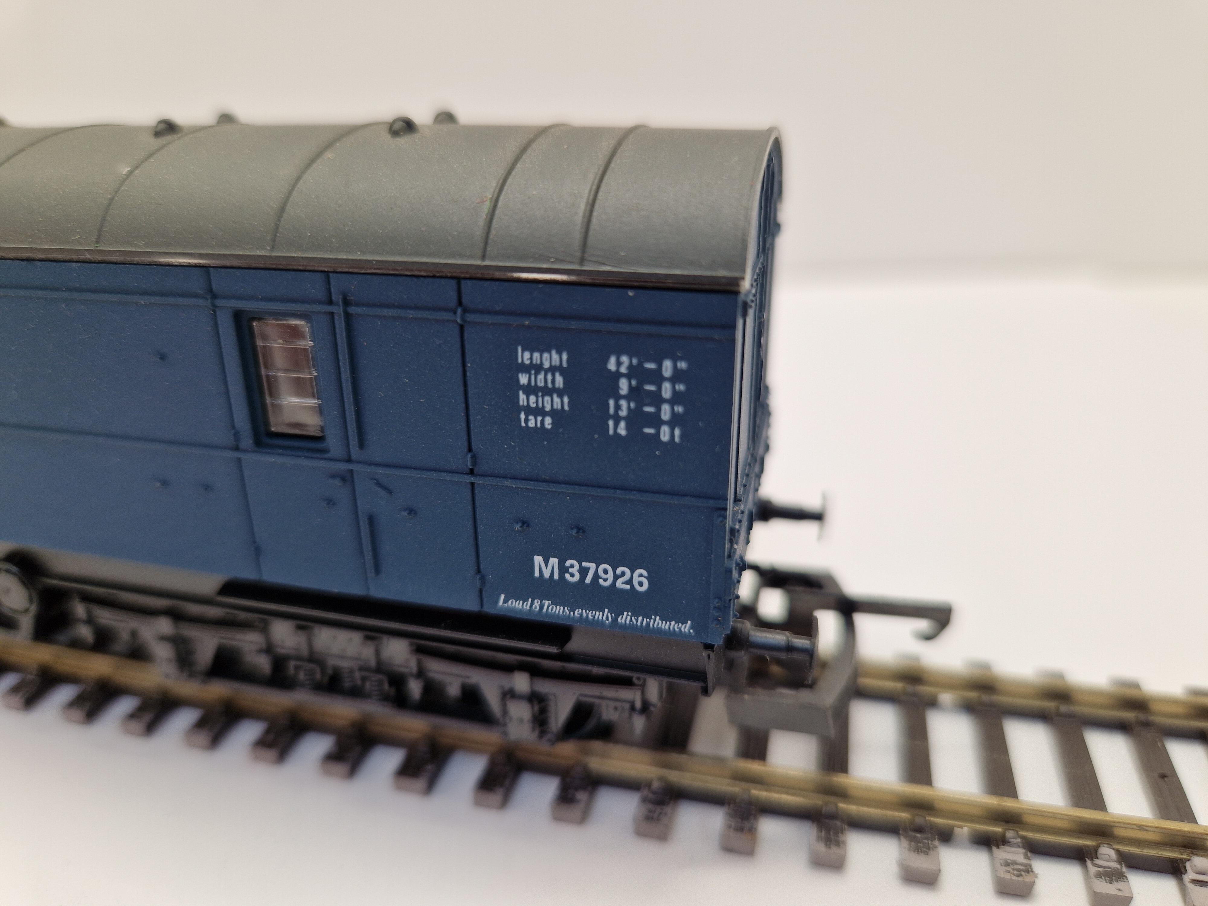 A pre-owned LIMA 305360W Ex LMS 42' GUV bogie parcels van in BR Blue
