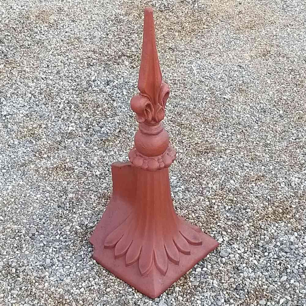 Angled block end spire ridge finial