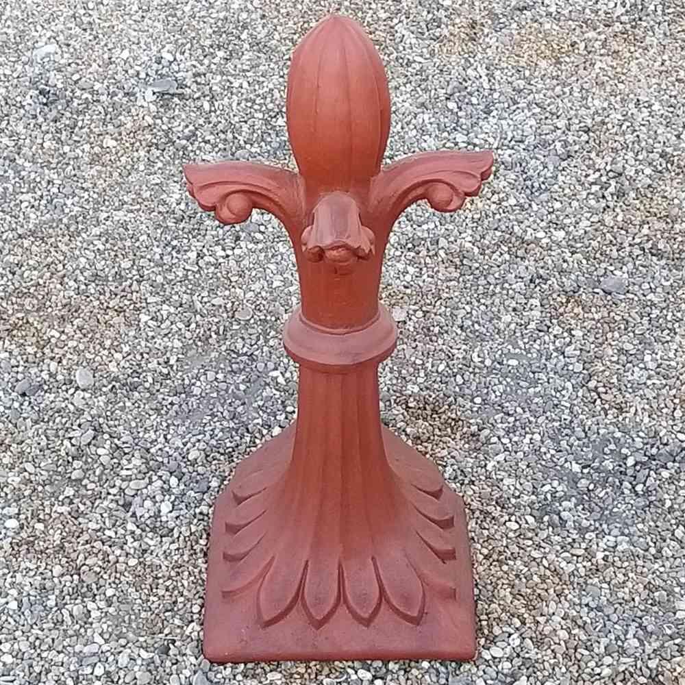 Angled block end ornate fleur de lys finial