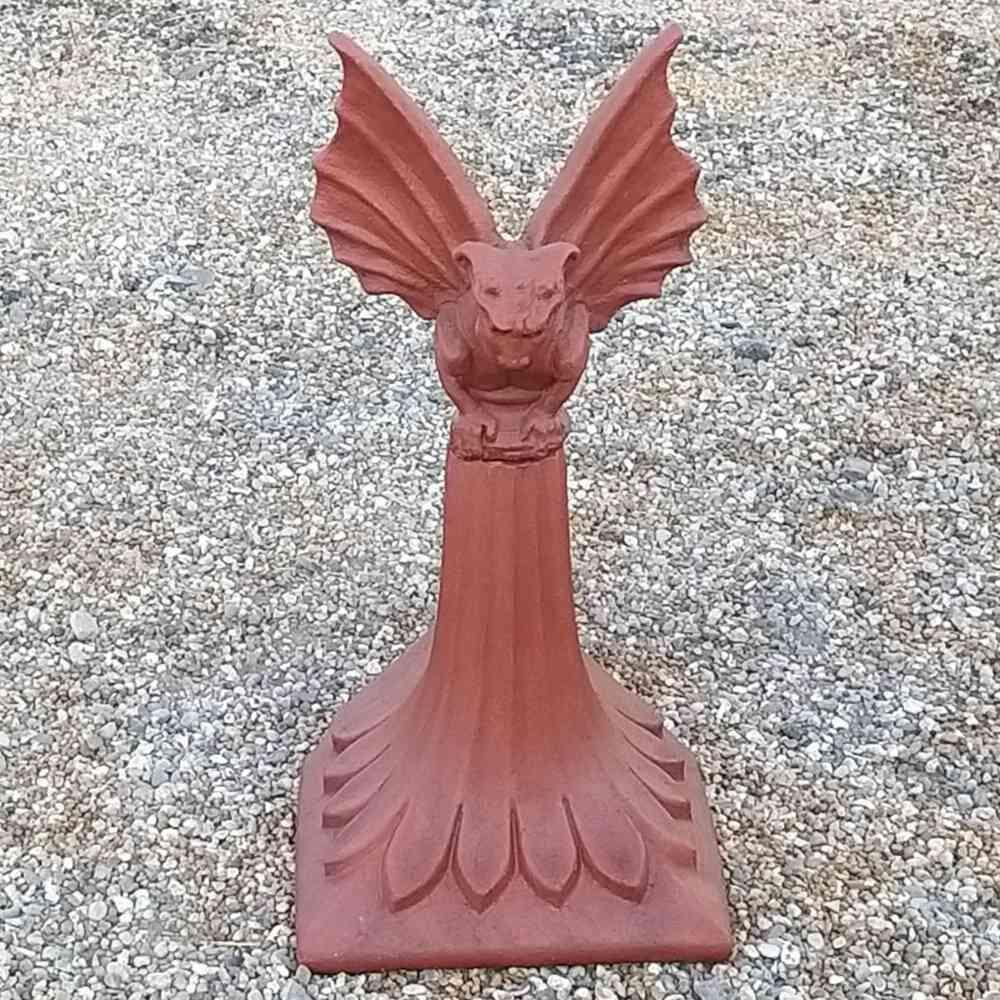 Angled block end winged gargoyle finial