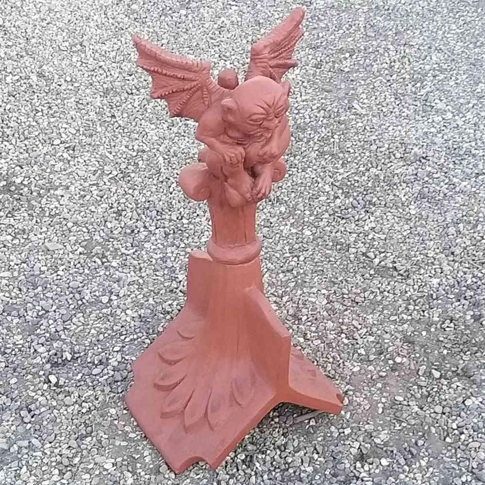 Column poking tongue gargoyle finial