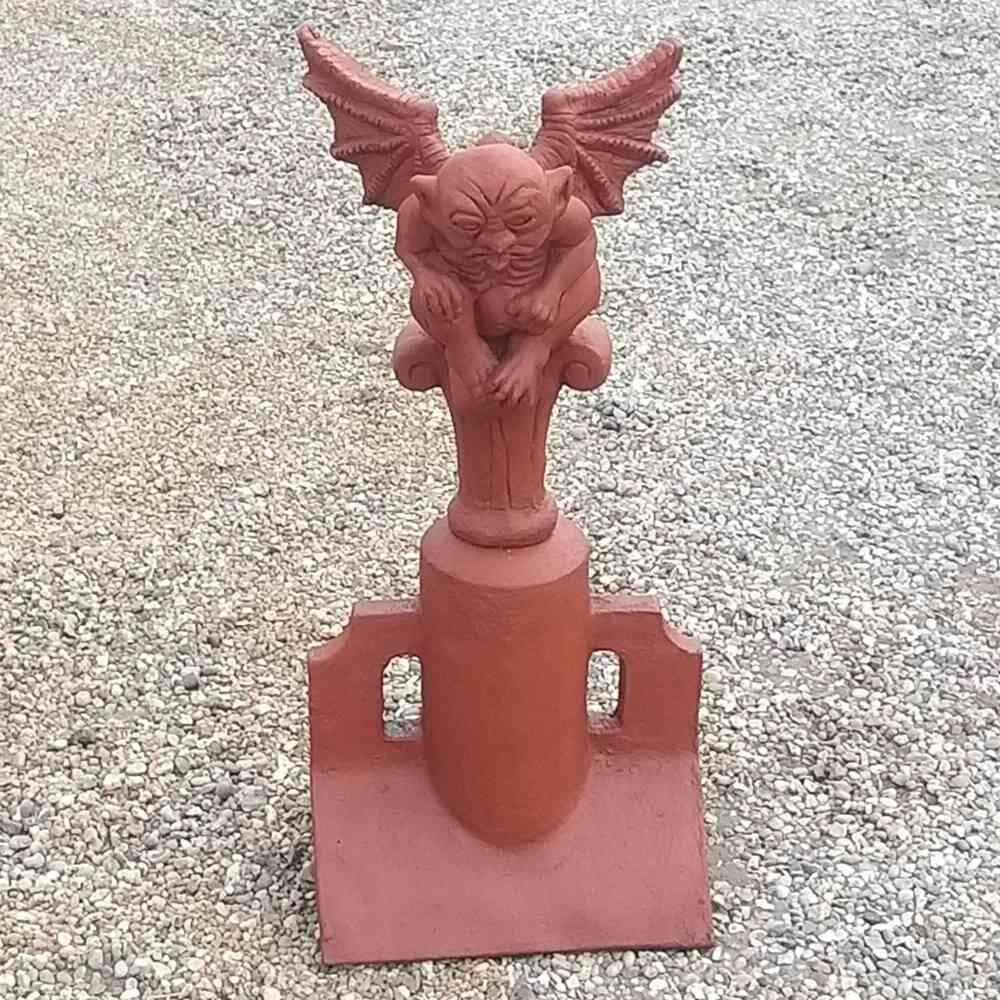 Double arch poking tongue gargoyle ridge finial
