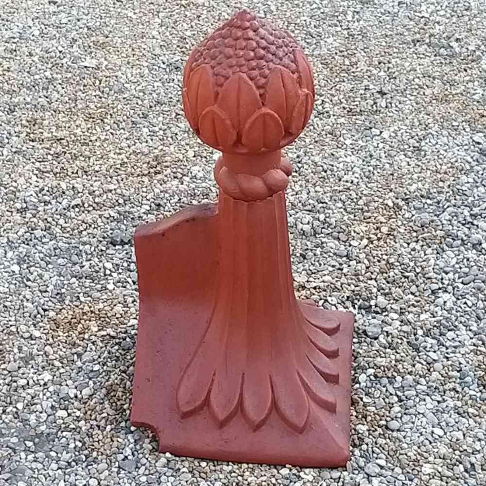 Angled block end grape roof finial