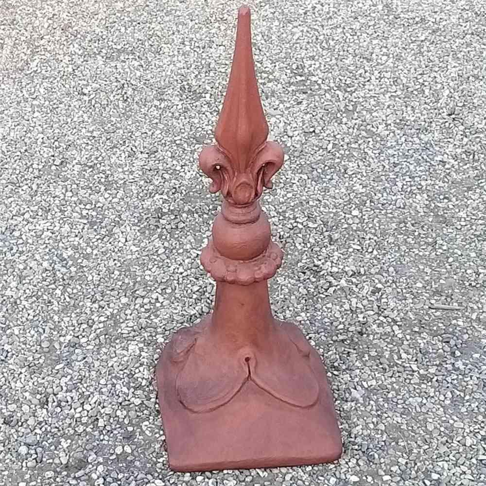 Block end angled spire ridge finial