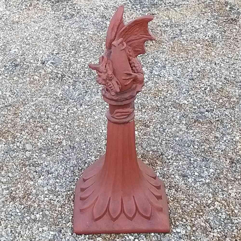 Block end sabre dragon finial crest