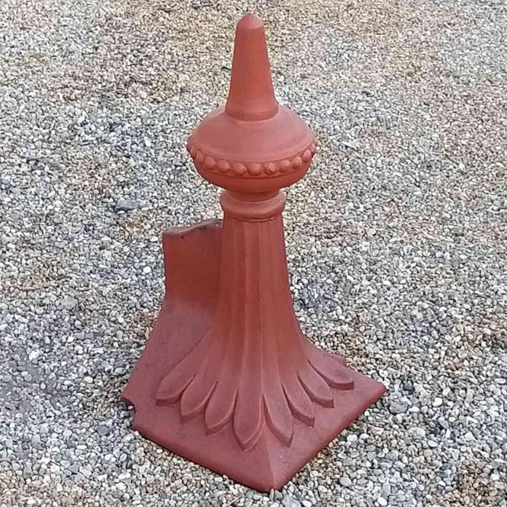 Angled block end topper roof finial