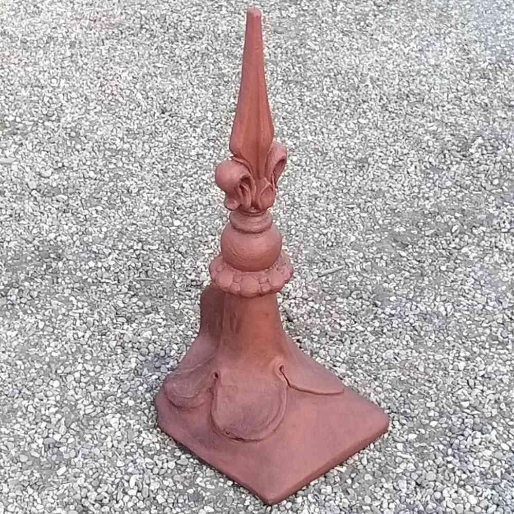 Block end angled spire ridge finial