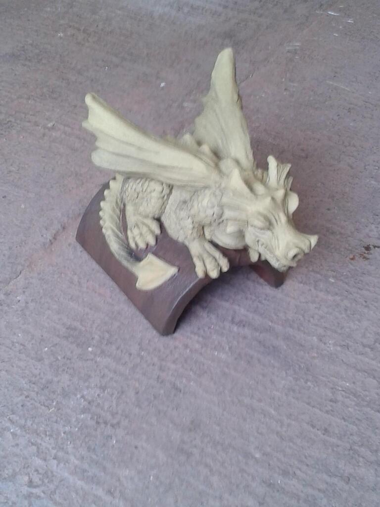 Marley chestnut brown and bathstone roof dragon
