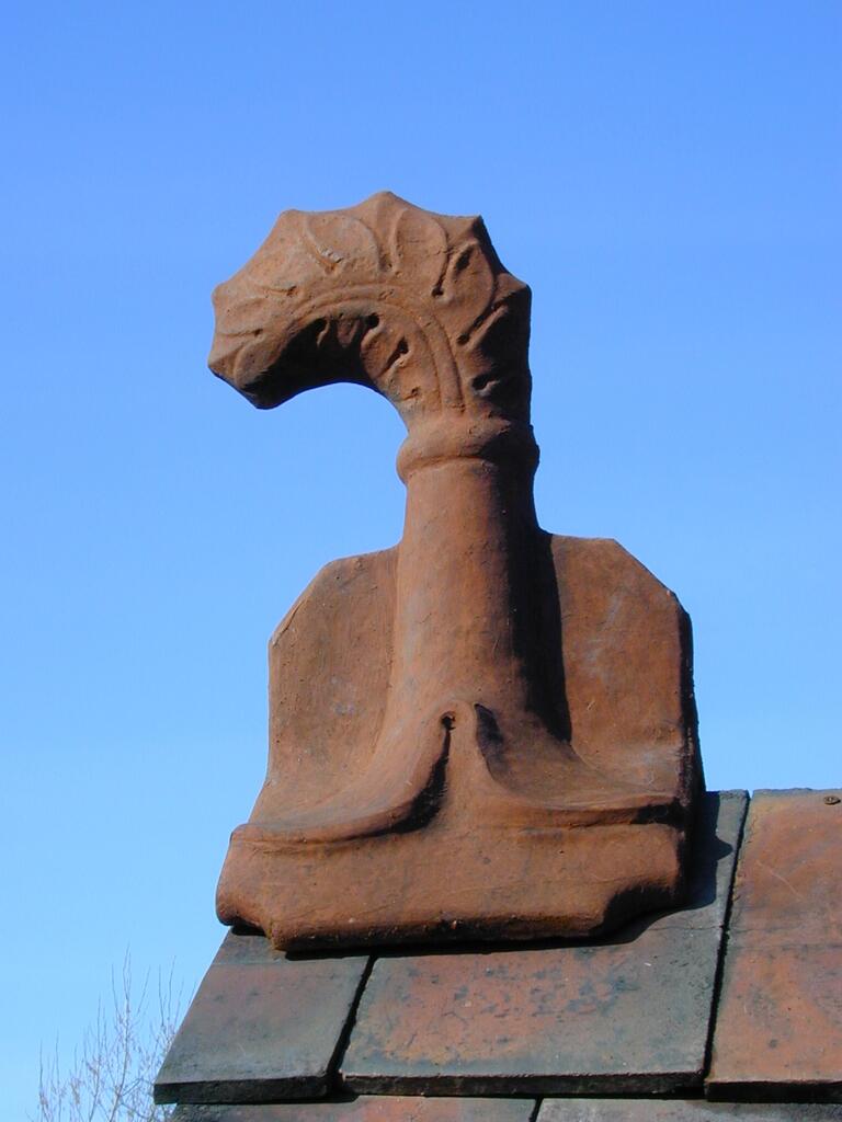 Leaf roof finials and decorative ridge tiles for roofs